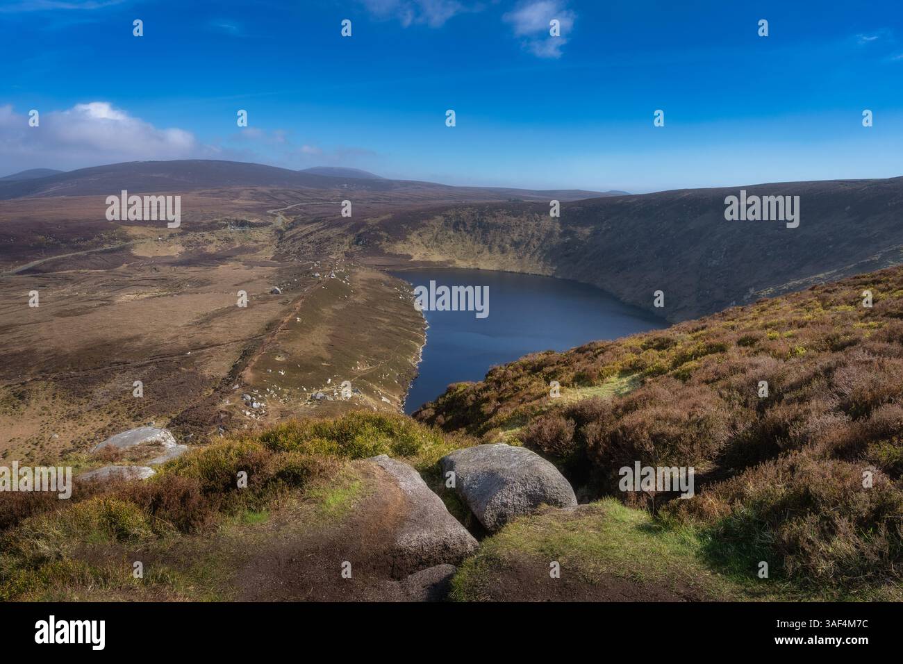 Enjoy the stunning view of Lough Bray, a serene lake surrounded by ...