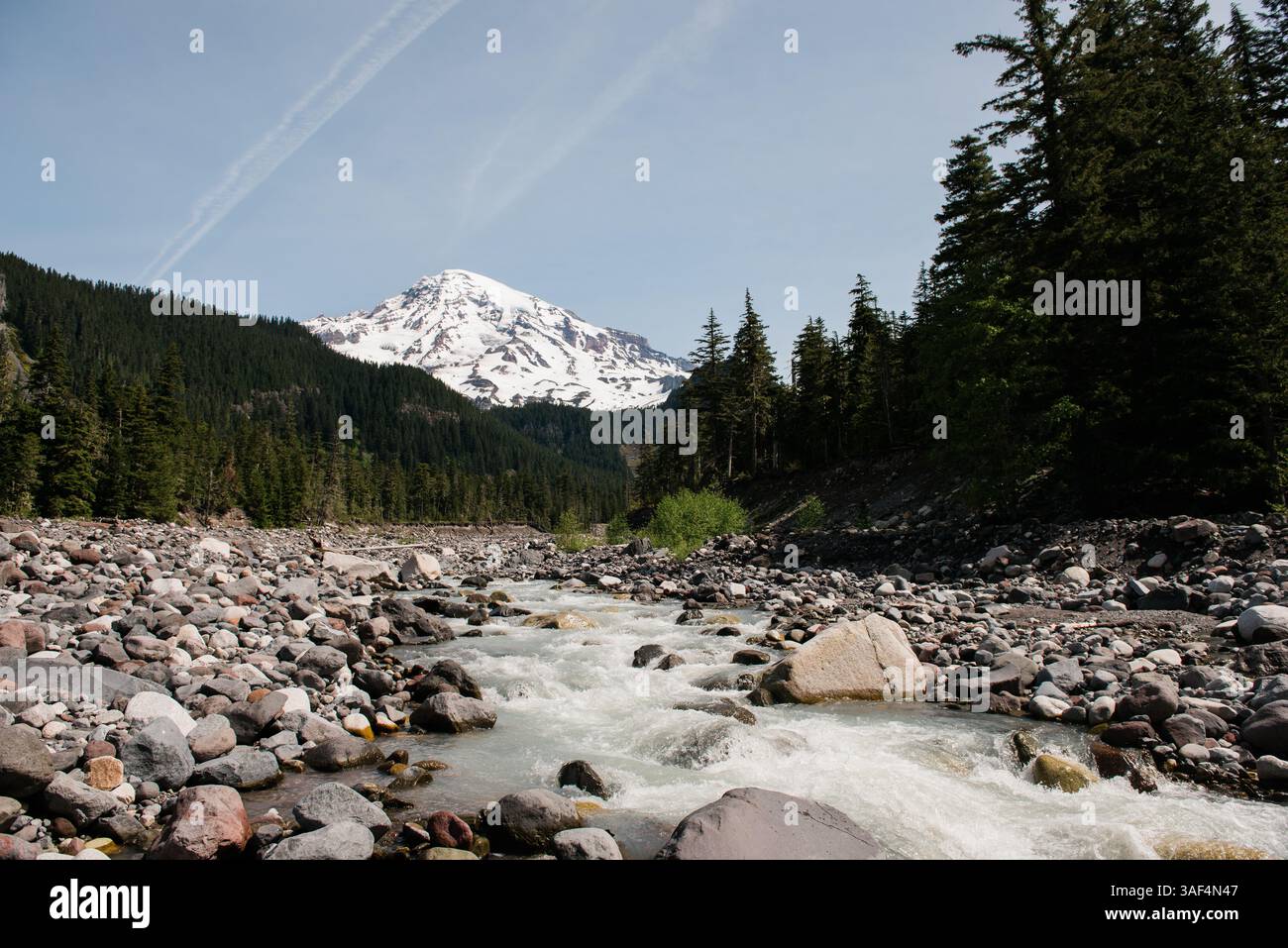 Glacial Waters Flow Beneath Mount Rainier Stock Photo - Alamy