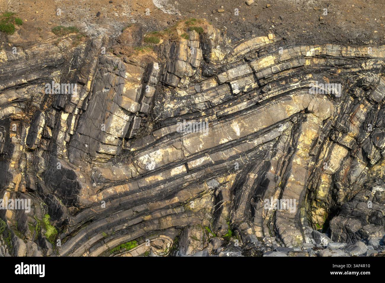 An impressive aerial view showcases complex, wavy rock layers that ...