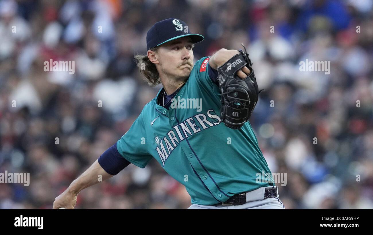 Seattle Mariners pitcher Bryce Miller throws to a San Francisco Giants ...