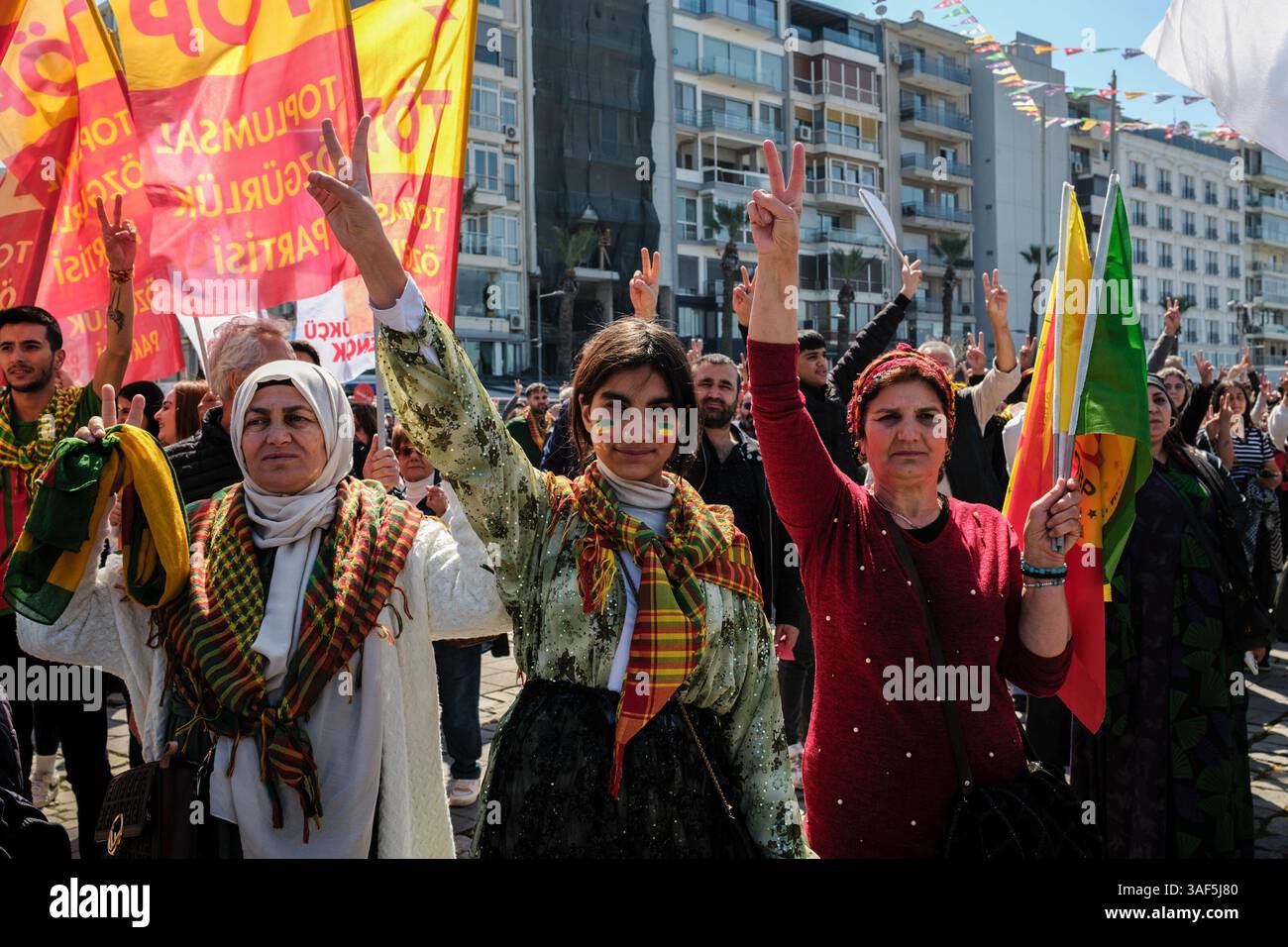 Women make victory signs during the celebrations Stock Photo - Alamy