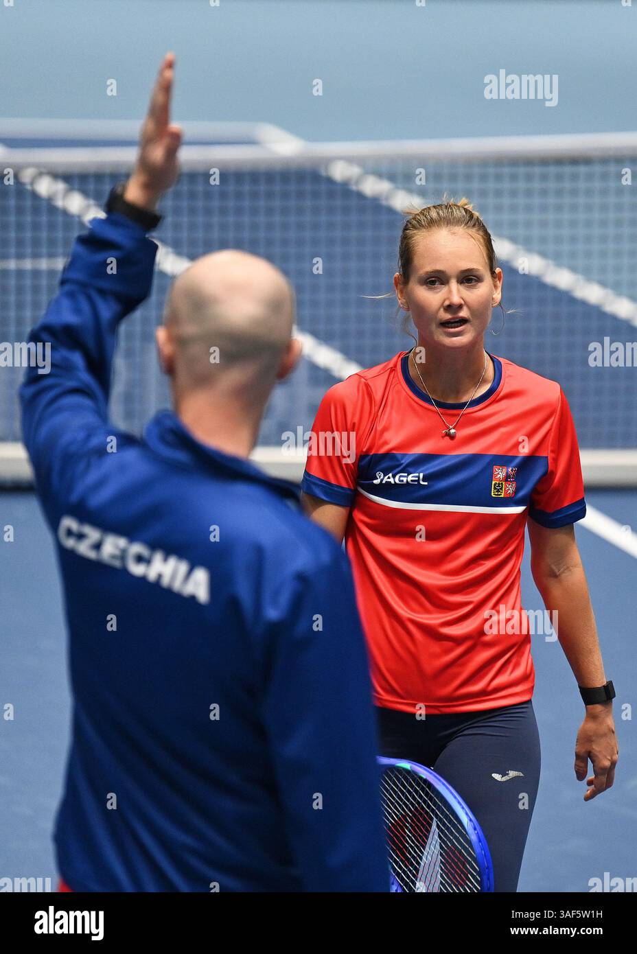 Czech tennis player Marie Bouzkova (right) and team captain Petr Pala ...