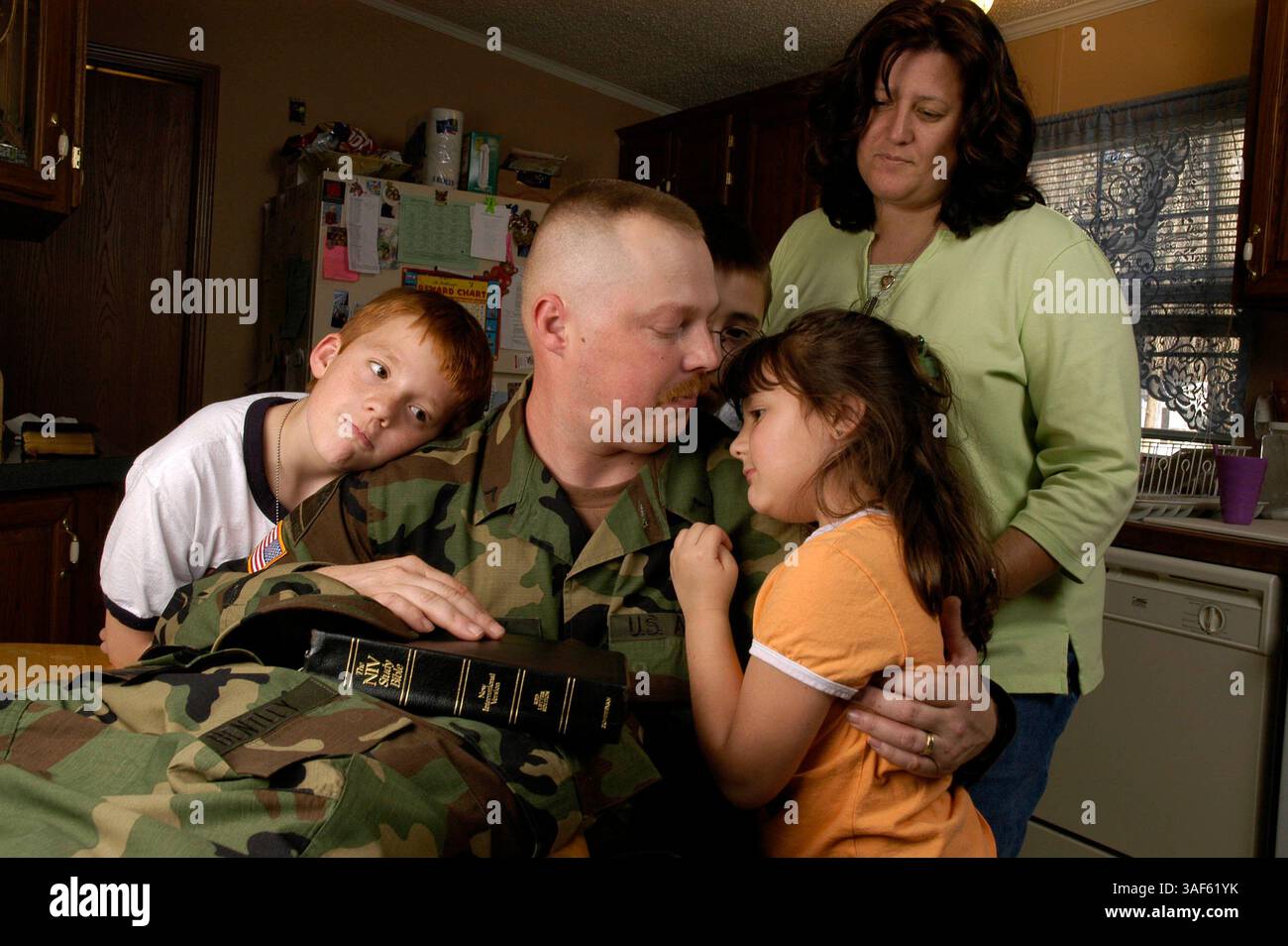Mar 13, 2005; Acworth, GA, USA; Pvt. RUSSELL BENTLEY, 33, is surrounded ...