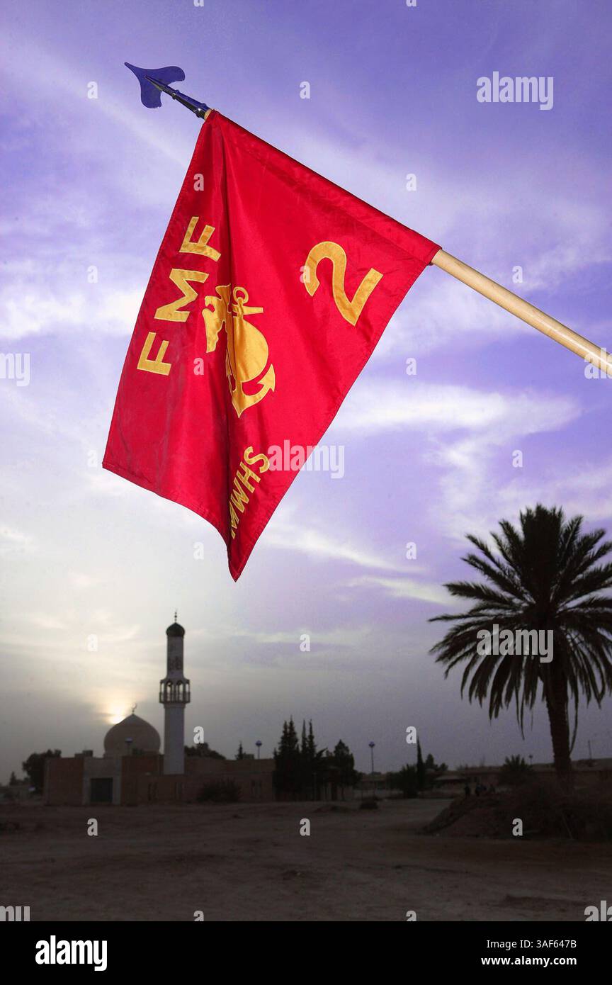Mar 05, 2005; Al Asad, Iraq; The MWHS-2 guidon waves as the sun sets on ...