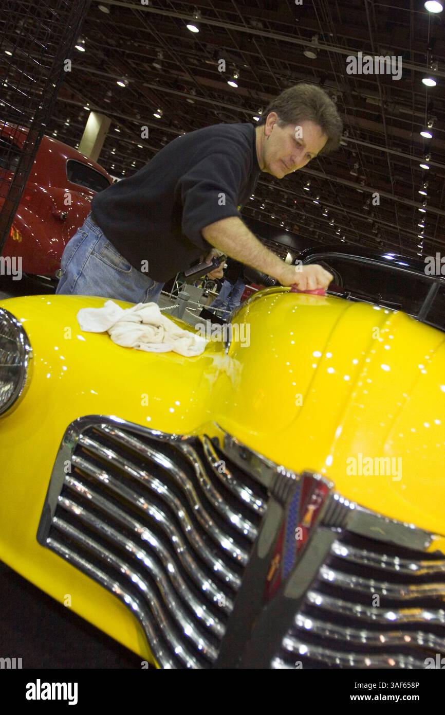 Mar 03, 2005; Detroit, Michigan, USA; Mike Quire polishes his 1941 ...