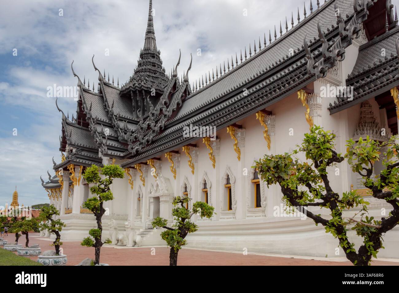 Detailed gold and white architecture of the Sanphet Prasat Throne Hall ...