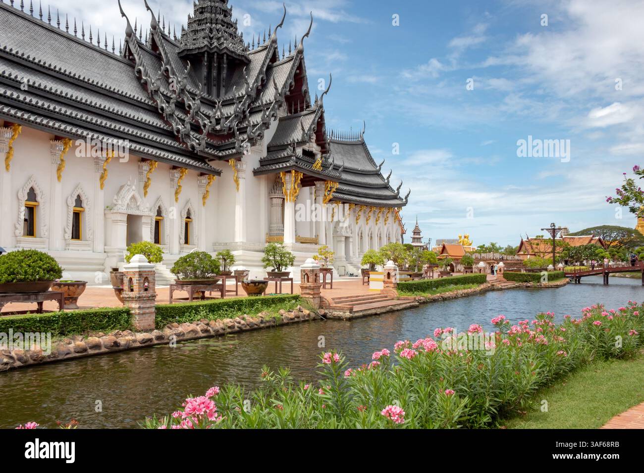 Detailed gold and white architecture of the Sanphet Prasat Throne Hall ...