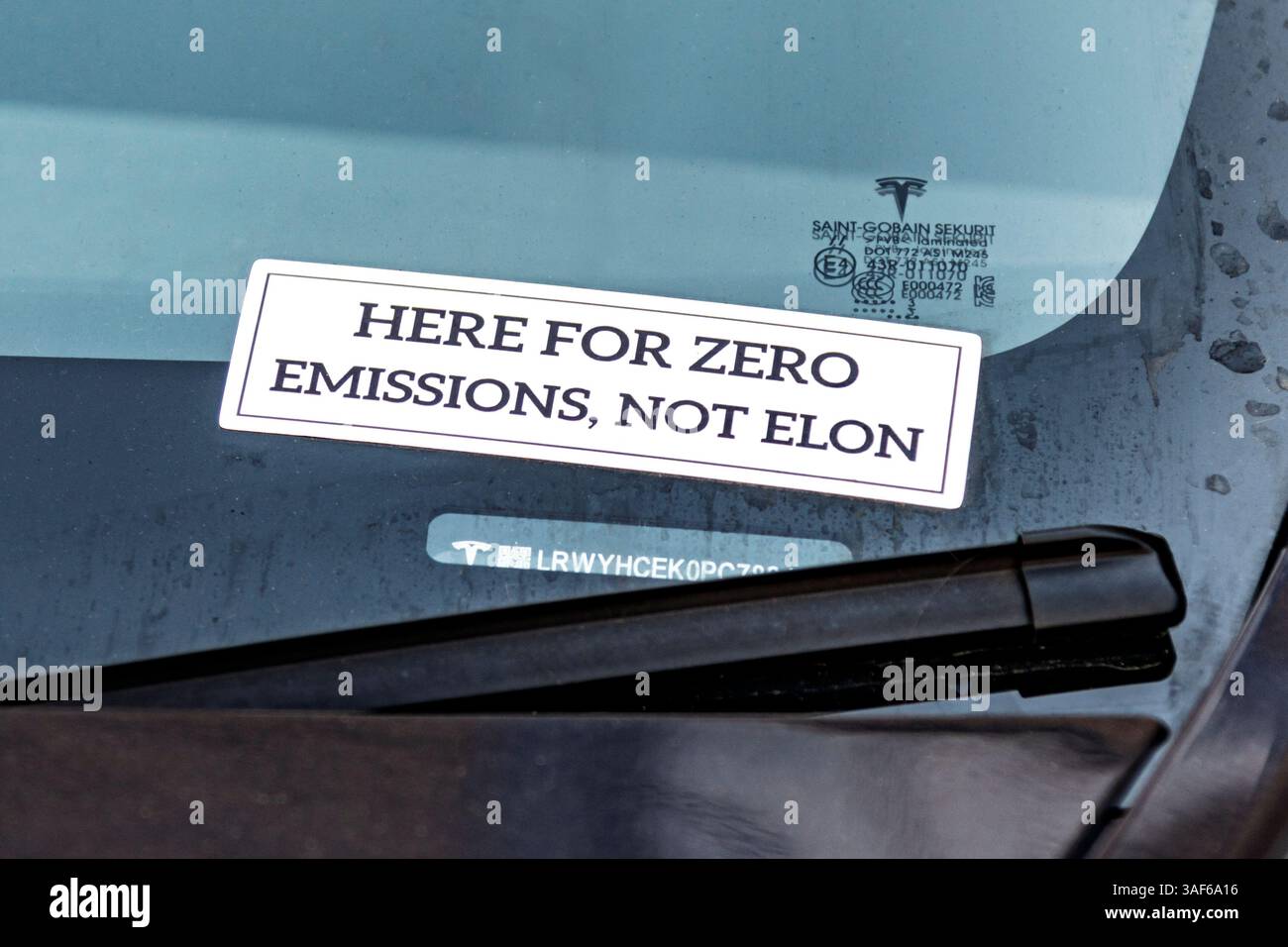 Anti-Elon Musk Tesla protest sticker Stock Photo - Alamy