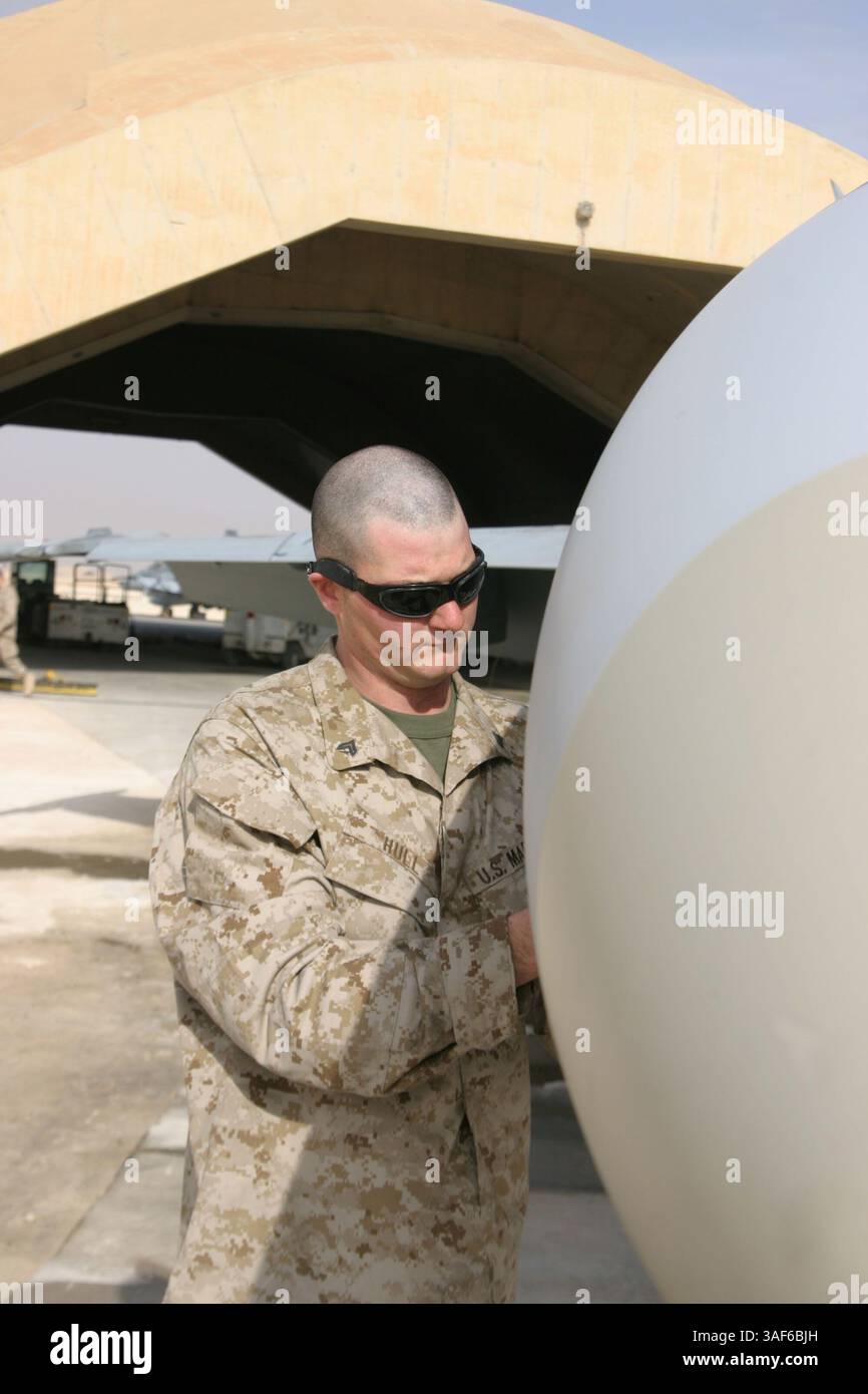 Feb 24, 2005; Al Asad, Iraq; Corporal DEREK HULL, communications and ...