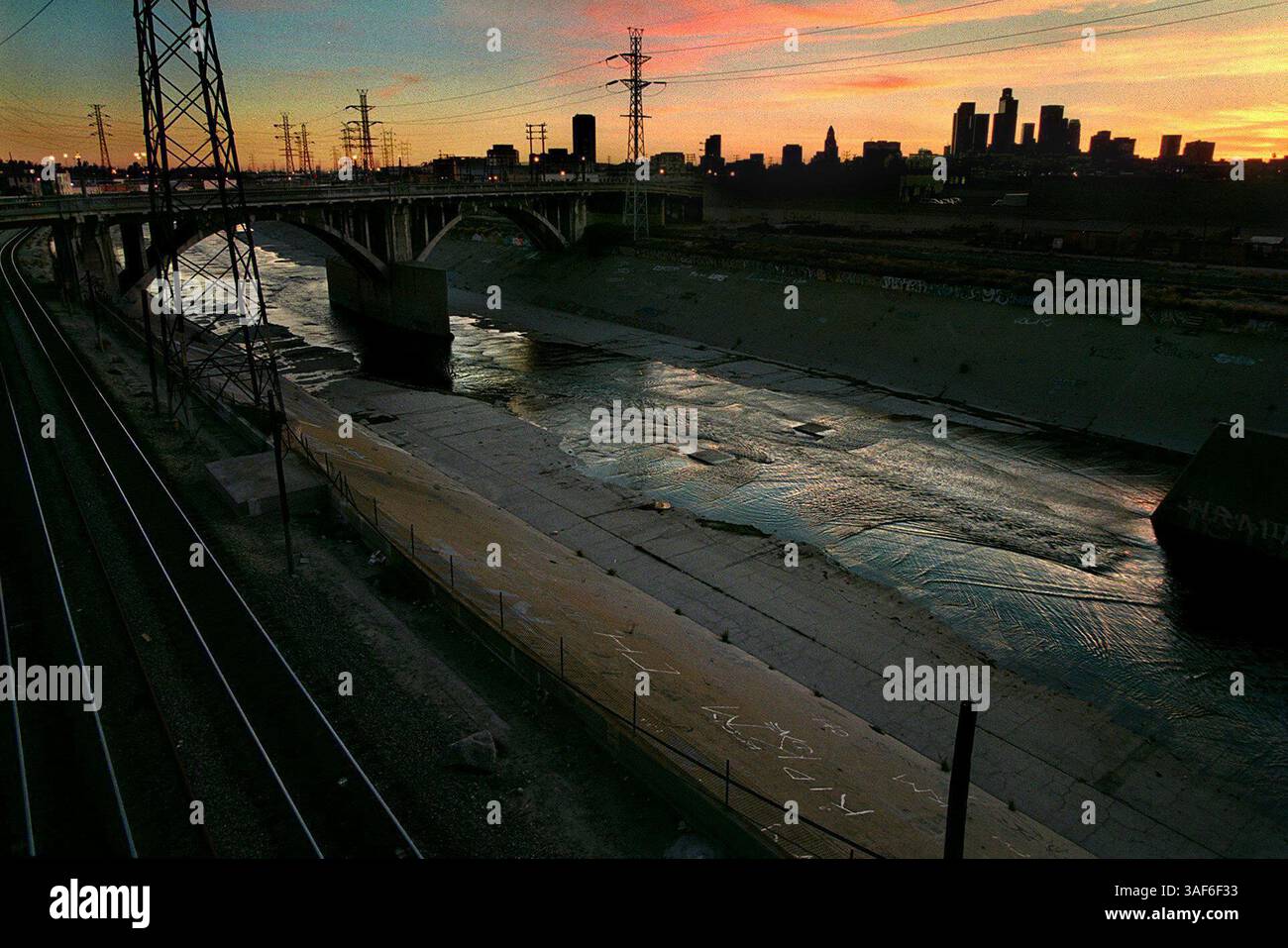 The Los Angeles River trickles through its concrete channel as the ...