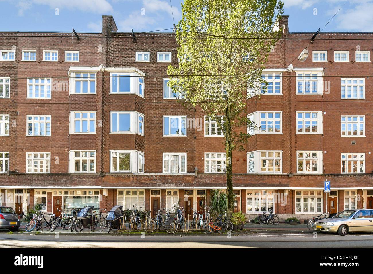 A picturesque urban apartment building showcasing classic architecture ...