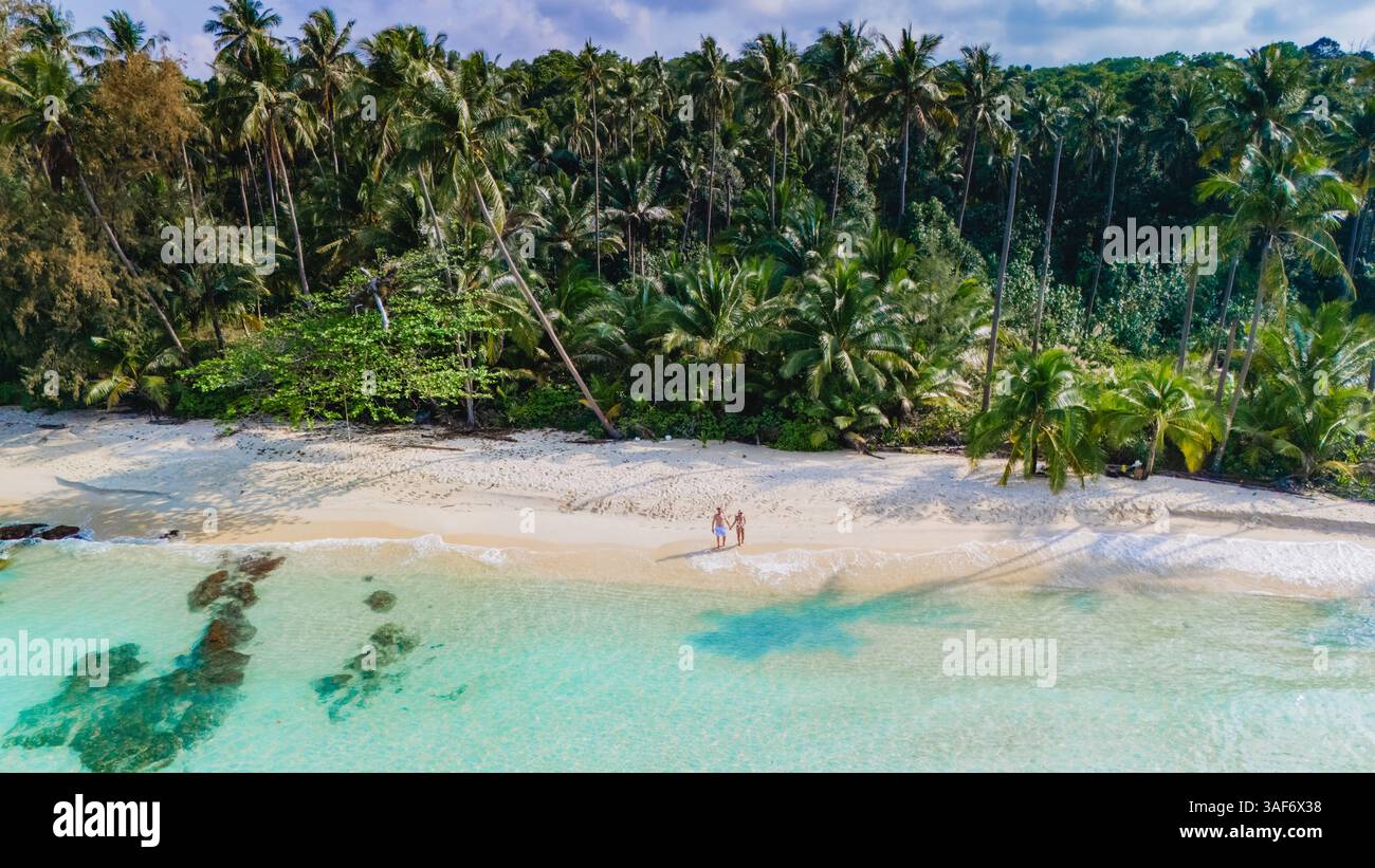 Discover the stunning views of Koh Kood Islands golden beach in Thailand, where natures beauty ...