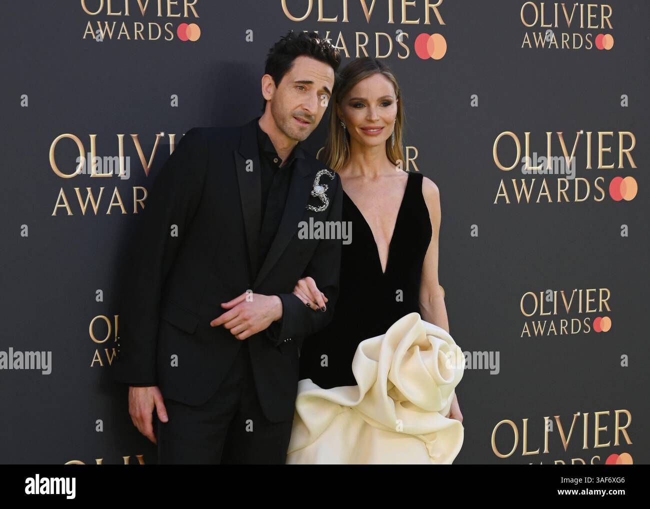 Adrien Brody and Georgina Chapman attends the 2025 Olivier Awards with ...