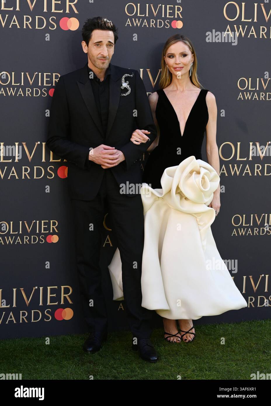 Adrien Brody and Georgina Chapman attends the 2025 Olivier Awards with ...