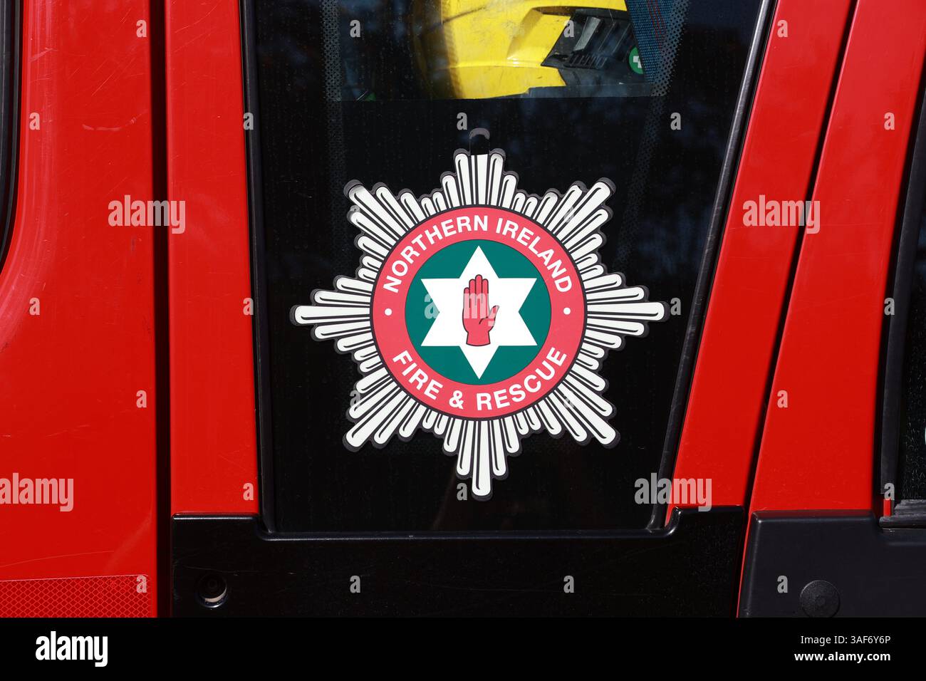 A Northern Ireland Fire and Rescue Service (NIFRS) logo on a fire ...