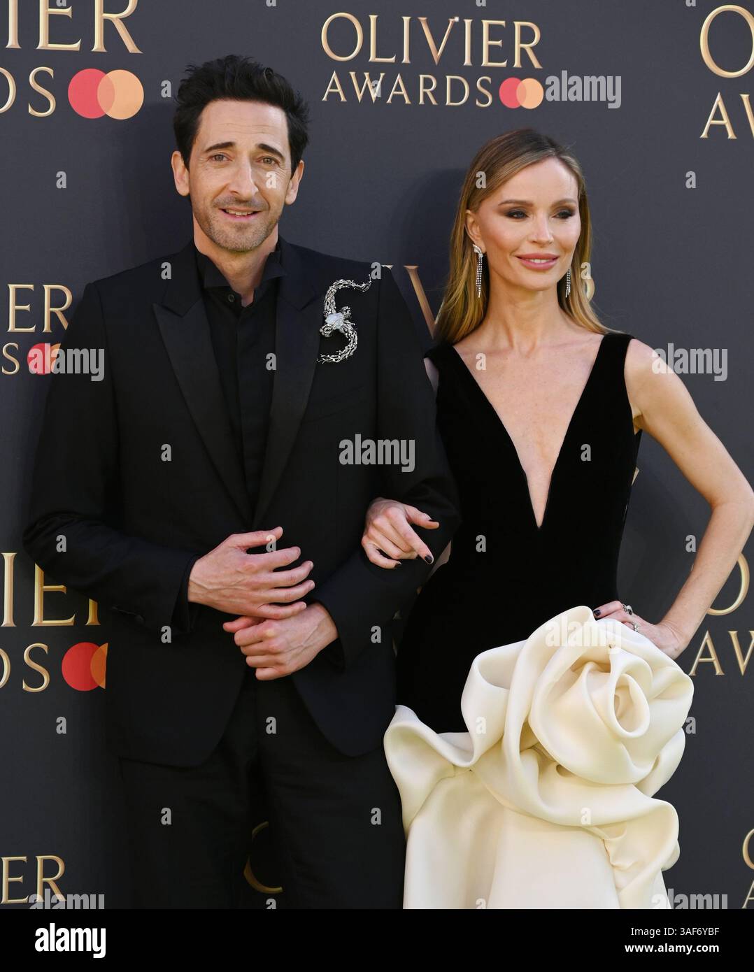 Adrien Brody and Georgina Chapman attends the 2025 Olivier Awards with ...
