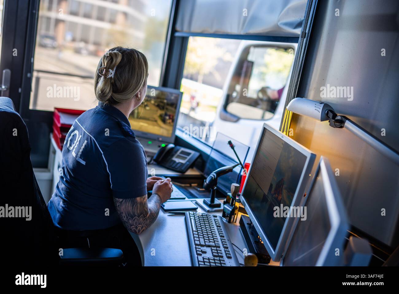Weil Am Rhein, Germany. 07th Apr, 2025. A customs officer works in a ...