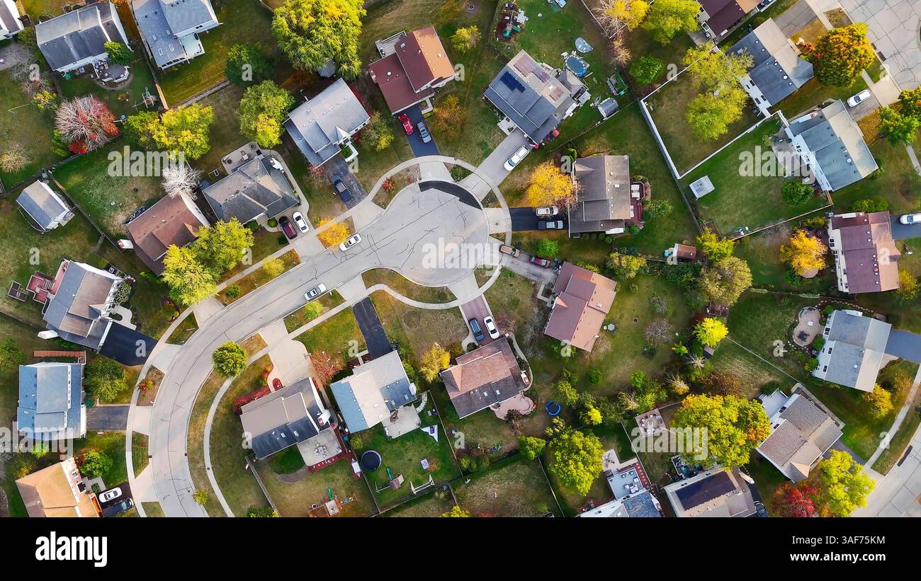 Aerial View of Suburban Neighborhood in Autumn. A vibrant aerial ...