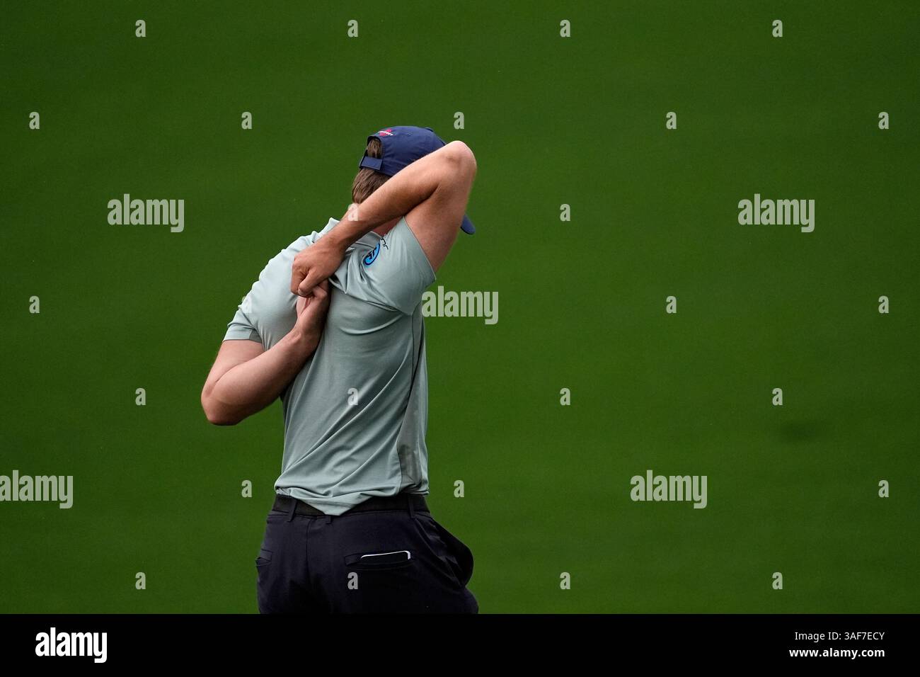 Thomas Detry, of Belgium, stretches during a practice round at the ...