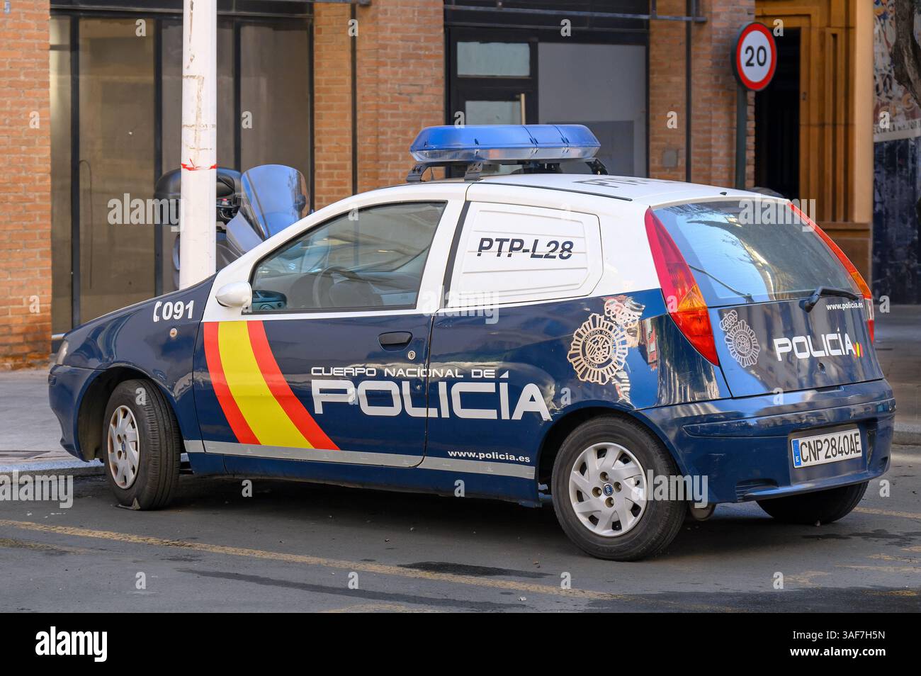 A National Police car stationary in front of a building.Murcia, Spain ...
