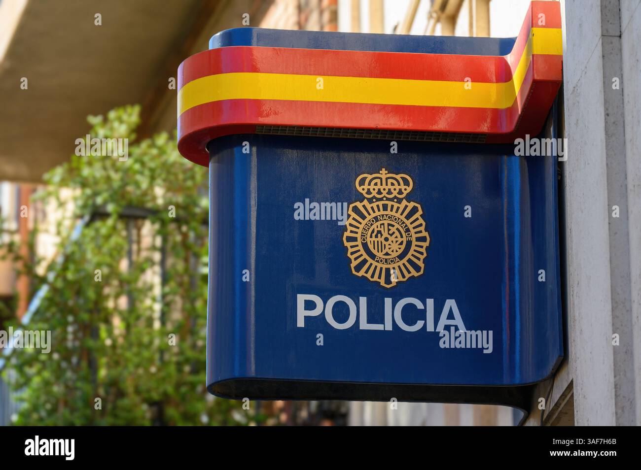 Wall sign featuring the colors and coat of arms of the National Police ...