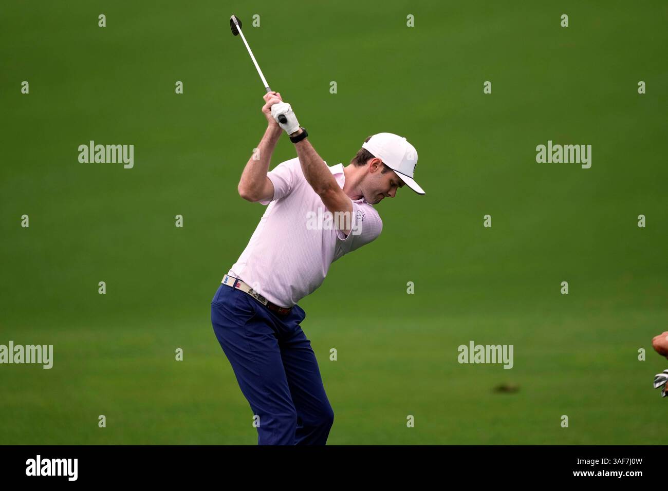 Evan Beck hits from the driving range during a practice around at the ...
