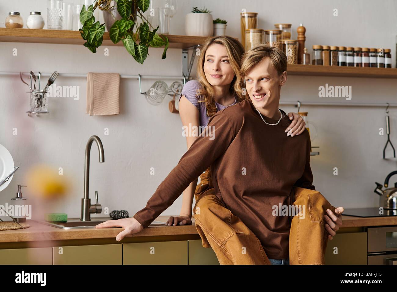 Couple shares a loving moment at home, showcasing their connection and ...