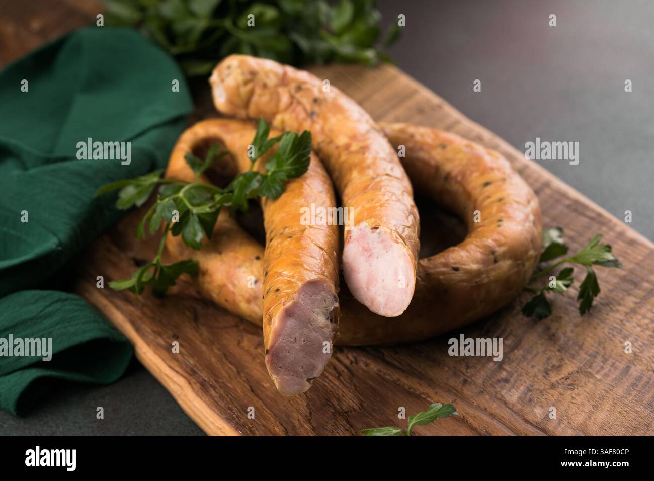 Fresh kielbasa being sliced knife hi-res stock photography and images ...