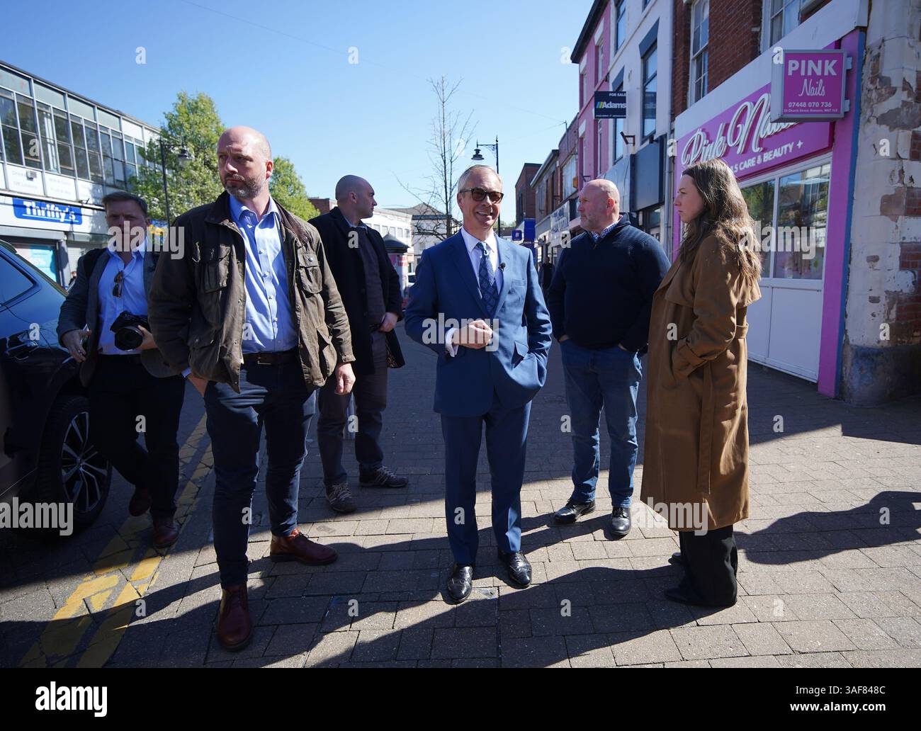 Reform UK leader Nigel Farage during a walkabout on Runcorn High Street ...