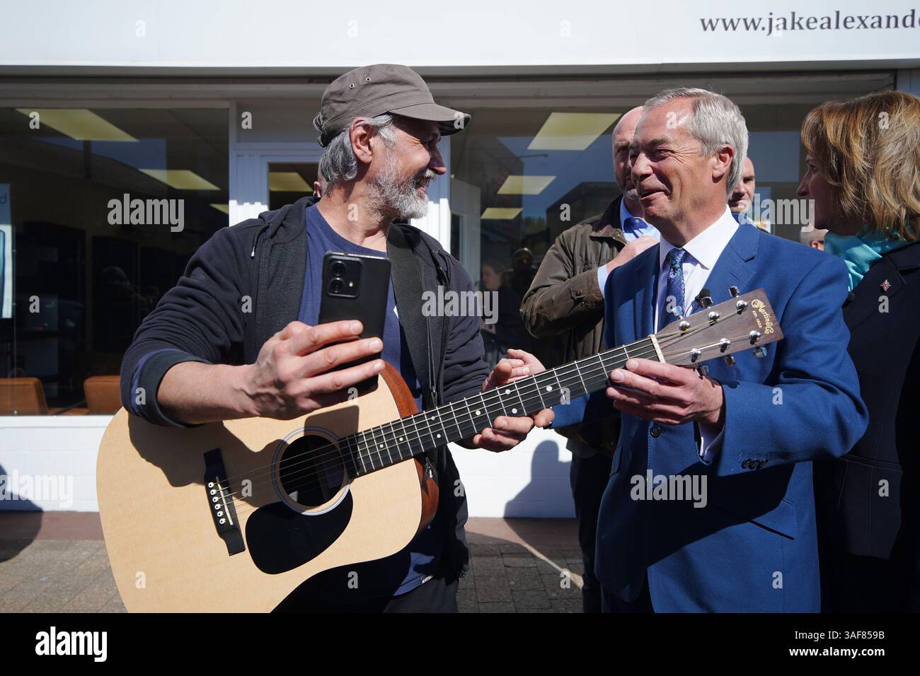 Reform UK leader Nigel Farage during a walkabout on Runcorn High Street ...