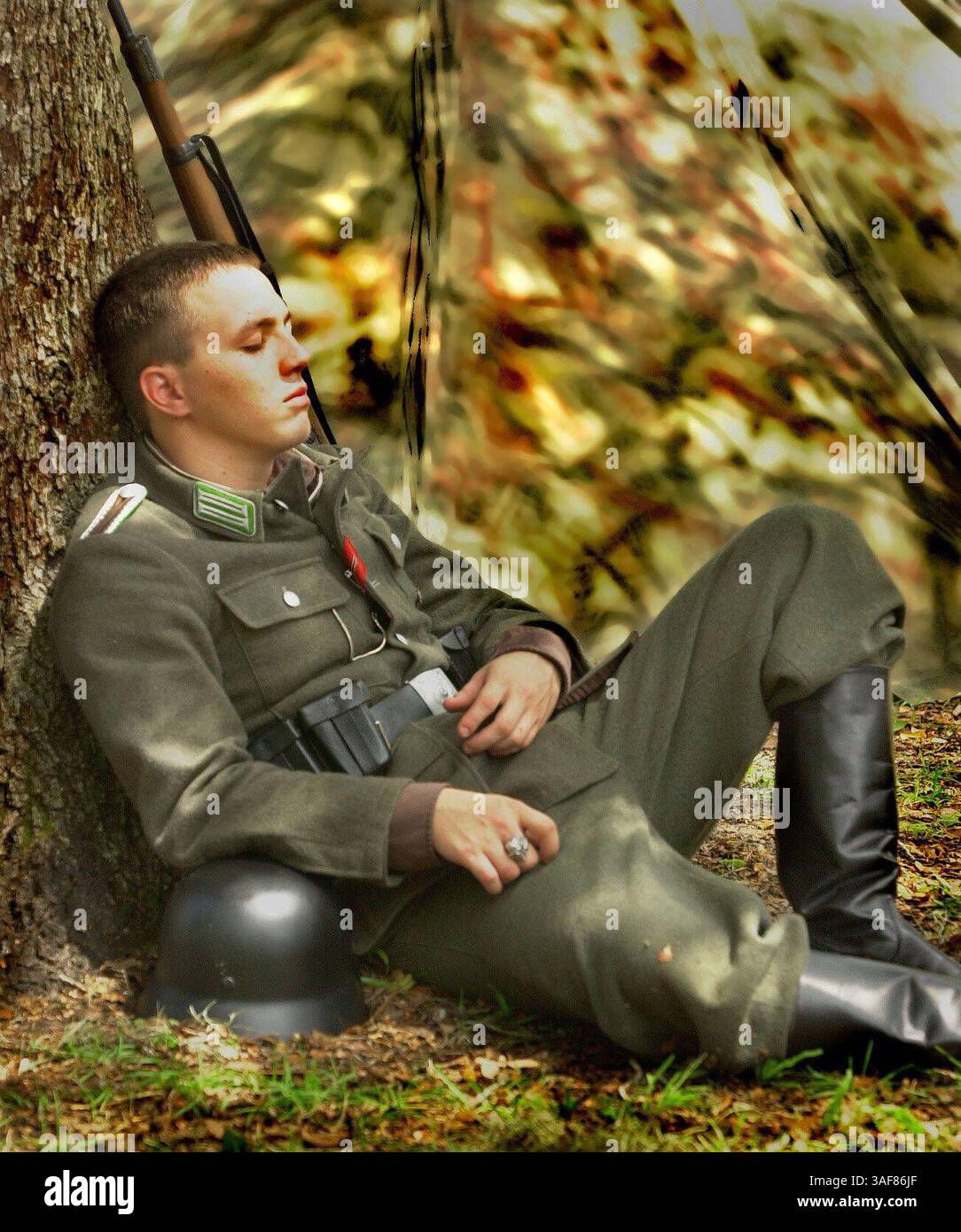 Wearing a heavy uniform Nathan Camechis, cq, Winter Haven, who is ...