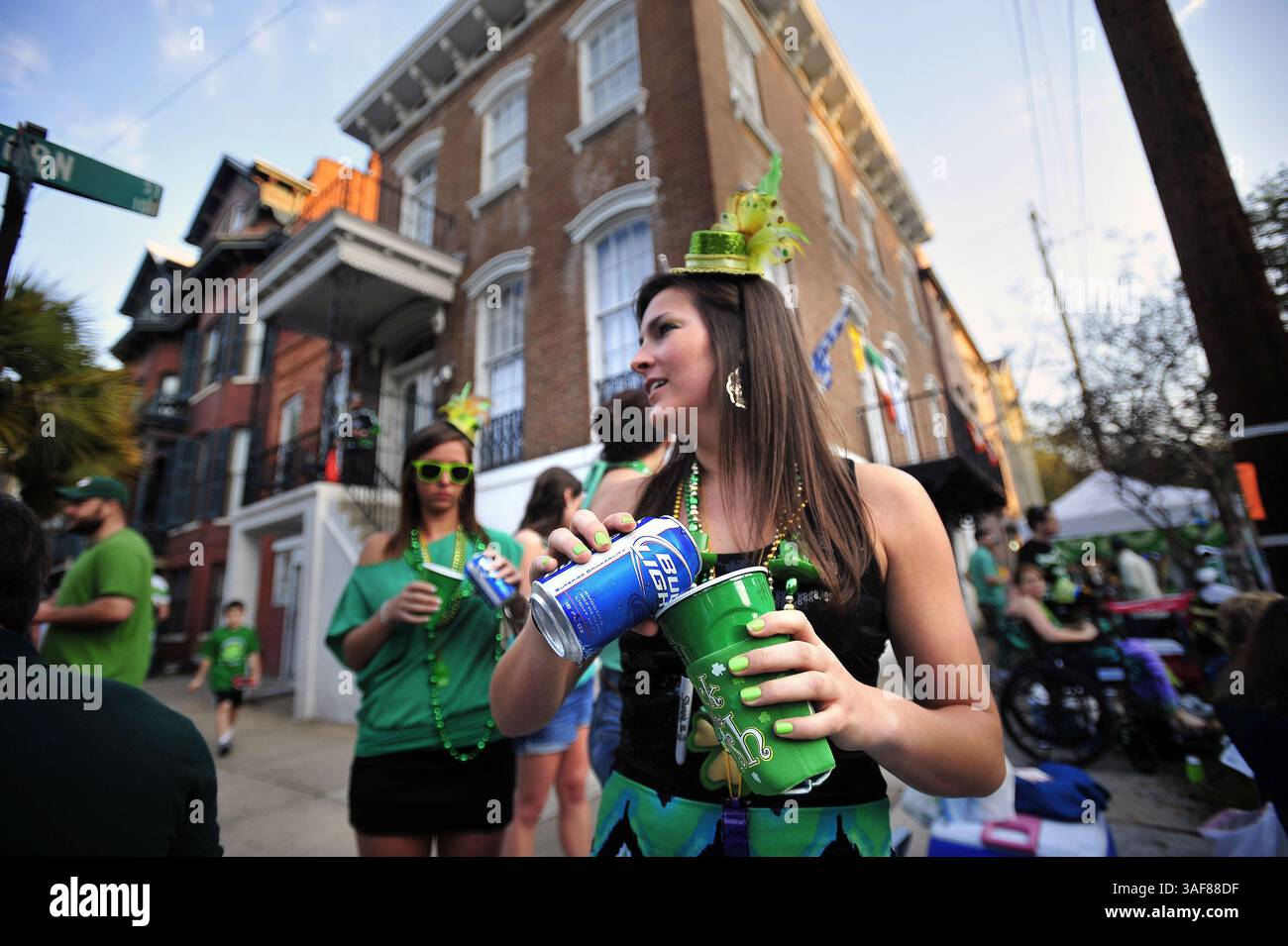 March 17, 2012 - Savannah, Ga, USA - Halynn Capwell pours herself a ...