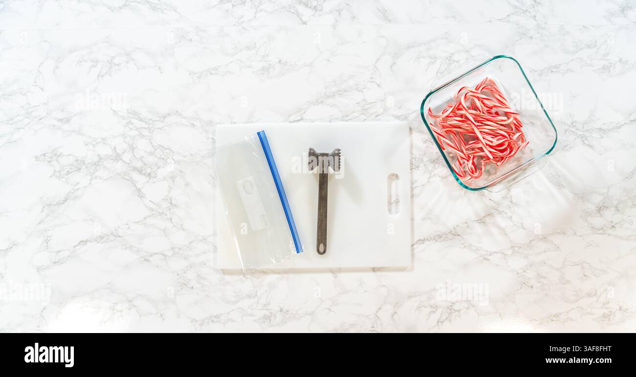 Preparing Crushed Candy Canes for Baking Projects Stock Photo - Alamy
