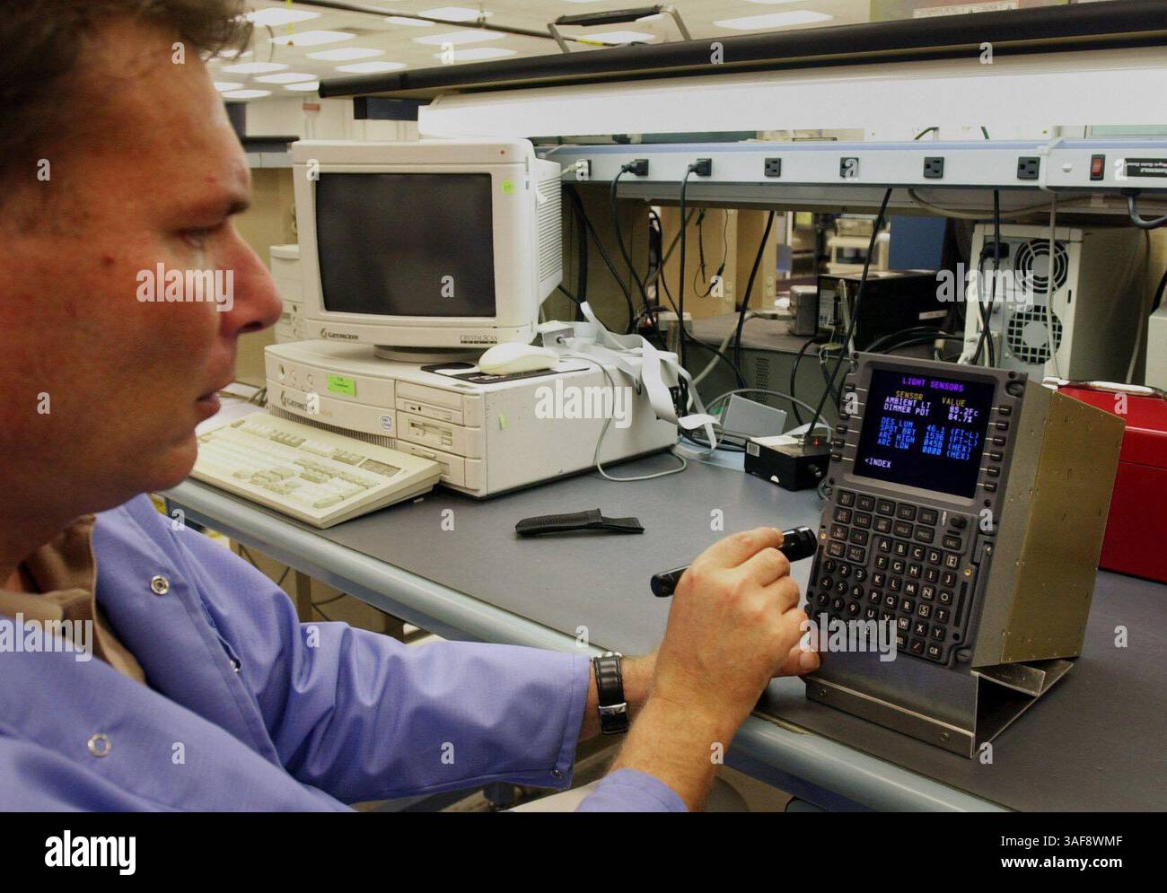 Senior Quality Engineer Robert Fullarton (cq) demonstrates how the ...
