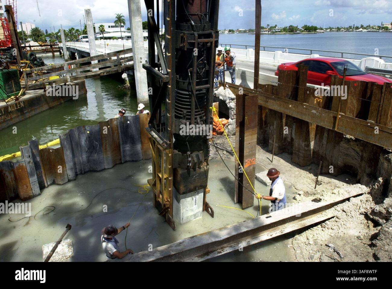 Randy Marshall (cq) (left) and Emmett Marshall (cq) (right) work on ...