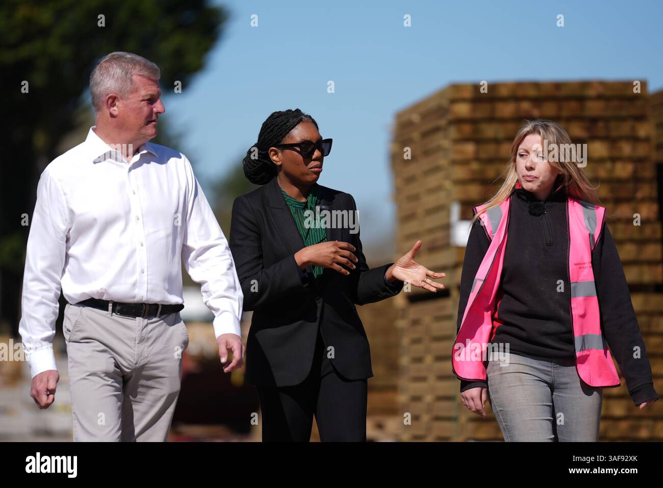 Conservative leader Kemi Badenoch (centre) with Stuart Andrew, MP for Daventry and Rachael ...