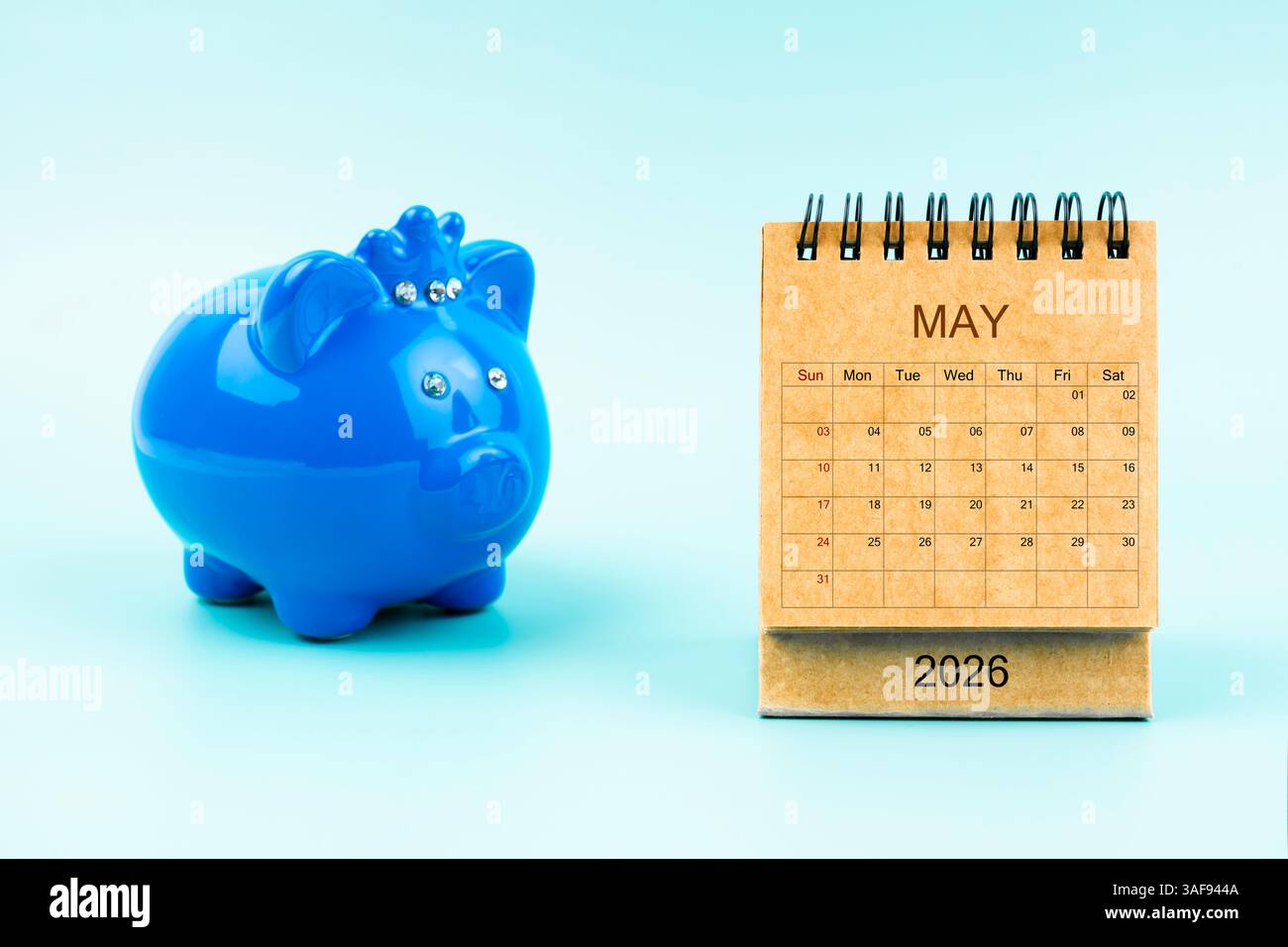 Blue piggy bank and blank May 2026 calendar, Reminder schedule of ...