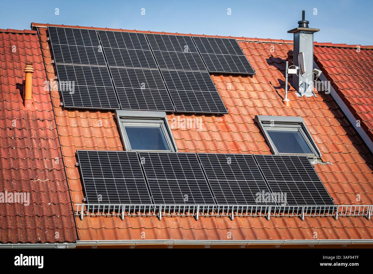 Photovoltaic panels on the roof of family house, solar panels ...