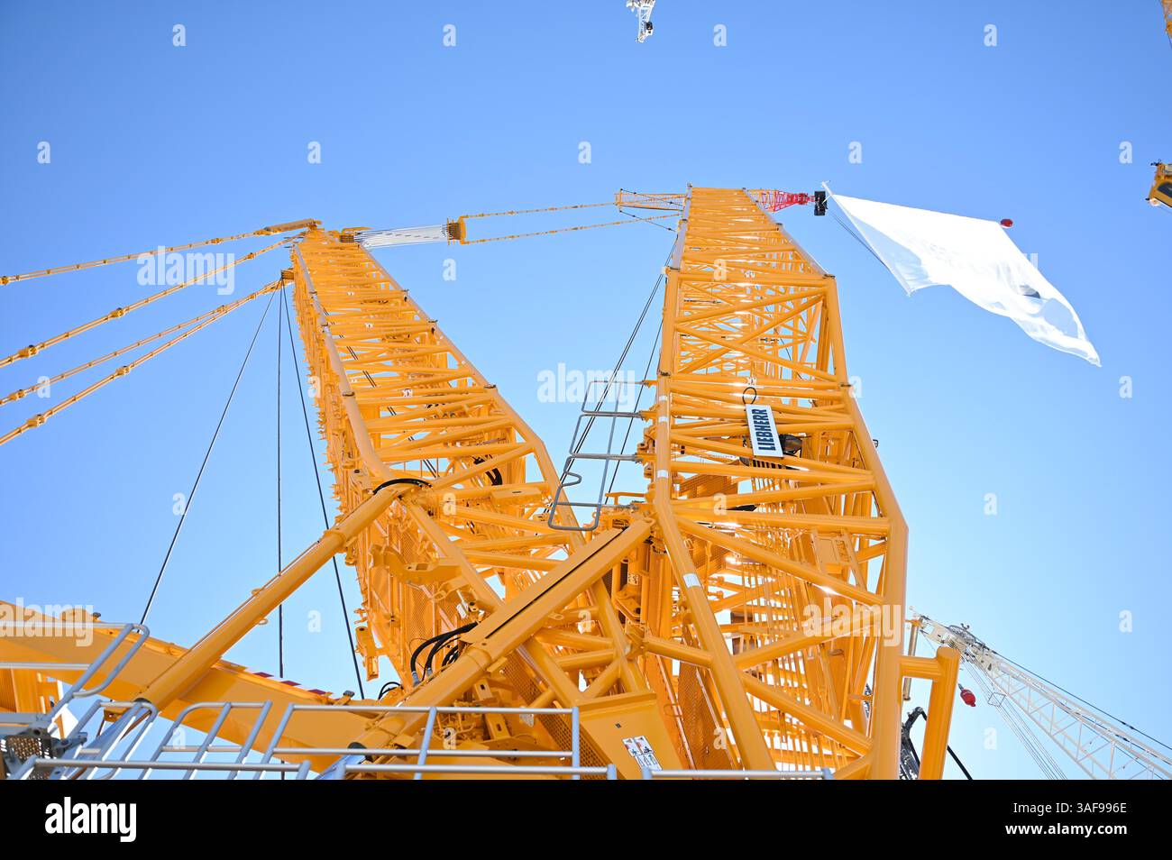 Munich, Germany. 07th Apr, 2025. A lattice boom crawler crane from ...
