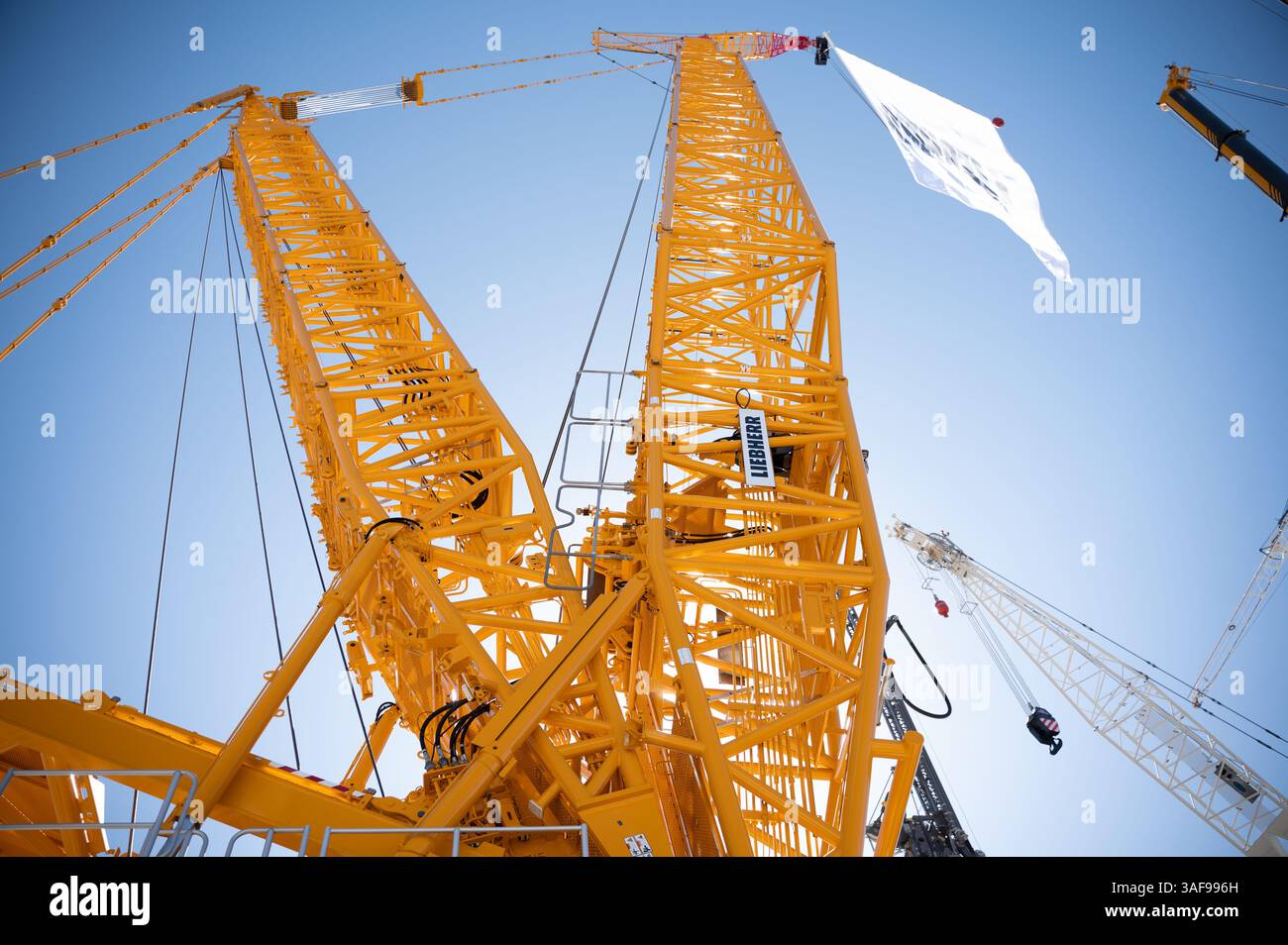 Munich, Germany. 07th Apr, 2025. A lattice boom crawler crane from ...