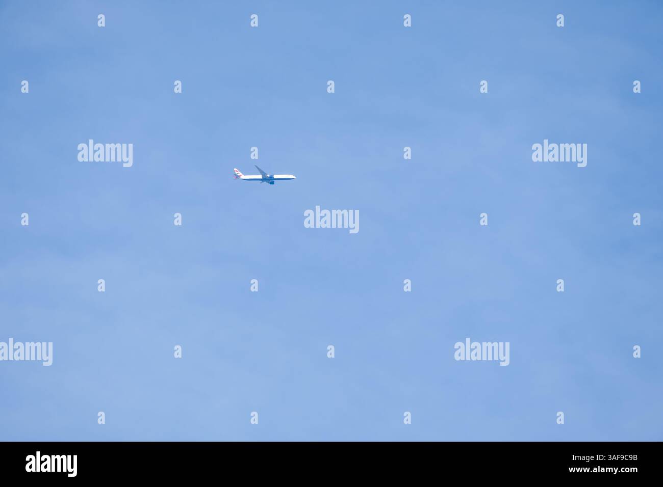 twin engine jet liner aircraft in deep blue sky Stock Photo - Alamy