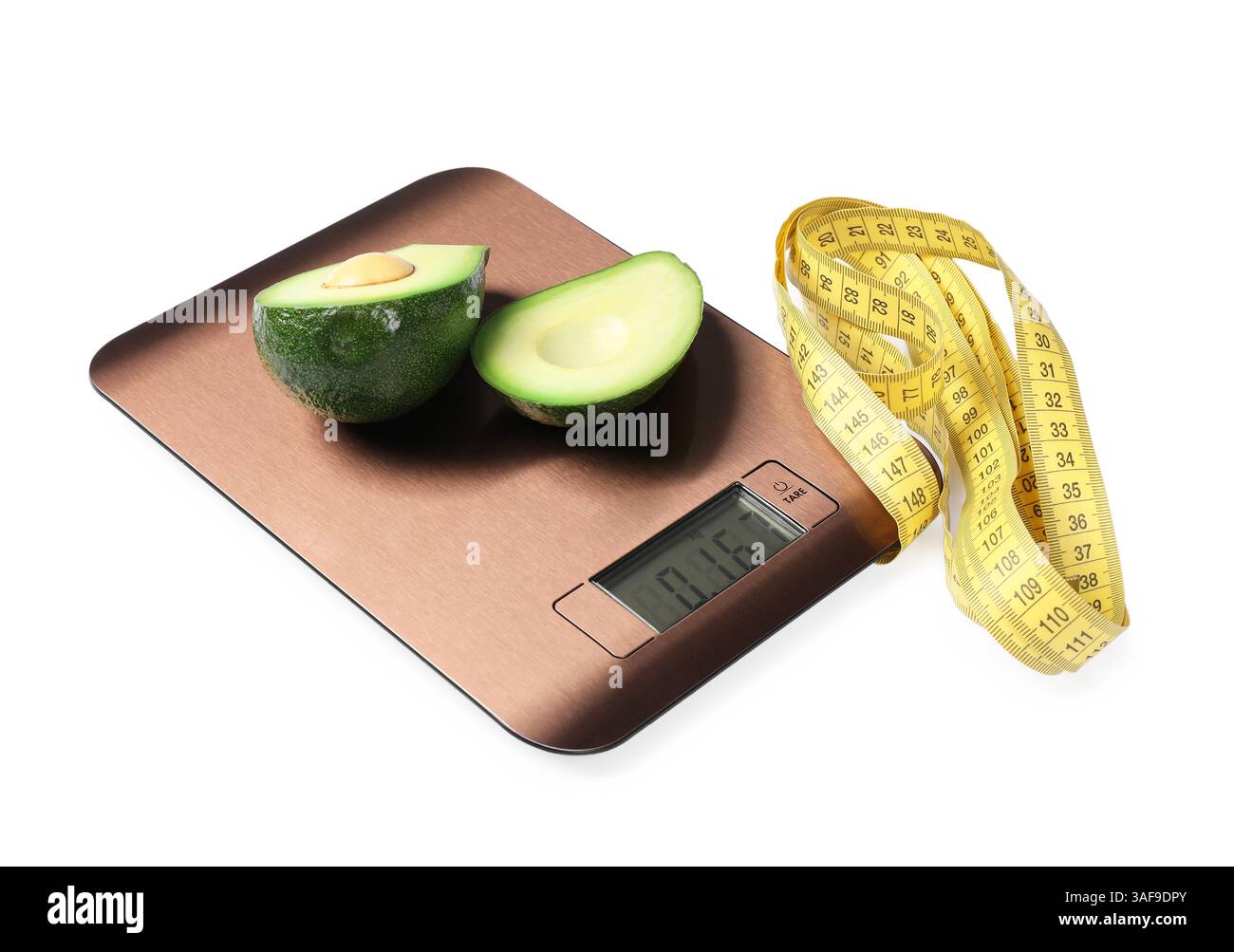 Electronic kitchen scales, avocado and measuring tape isolated on white ...