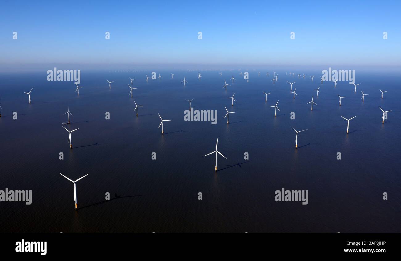 aerial view of wind turbines in the Irish Sea off the coast at Crosby ...