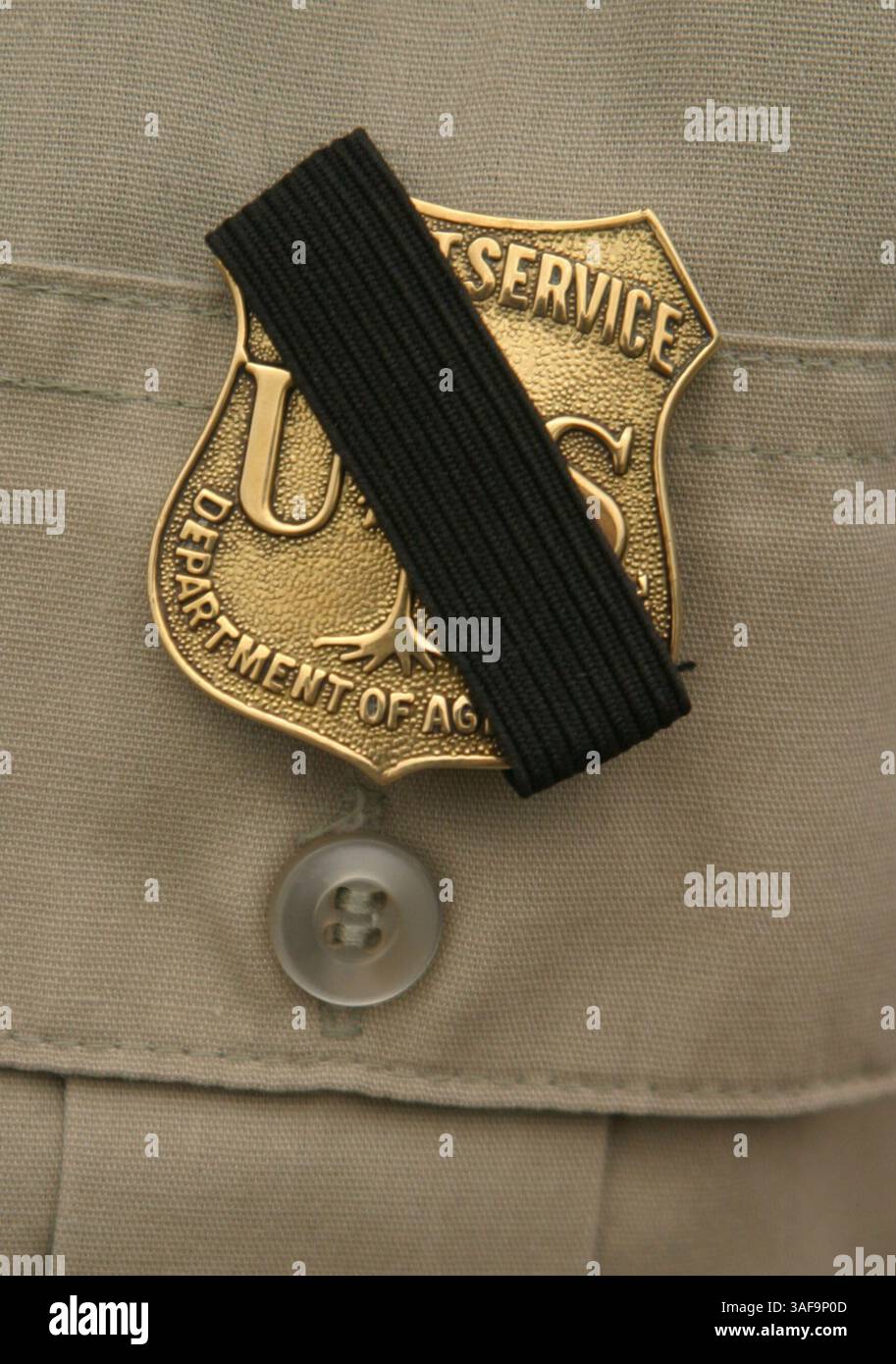 Oct 31, 2003; El Cajon, CA, USA; A US Forestry firefighter shows his ...