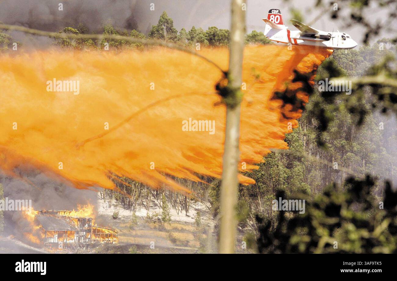Bill Lovejoy/Sentinel..A Trabing Road home burns as a Cal Fire tanker ...