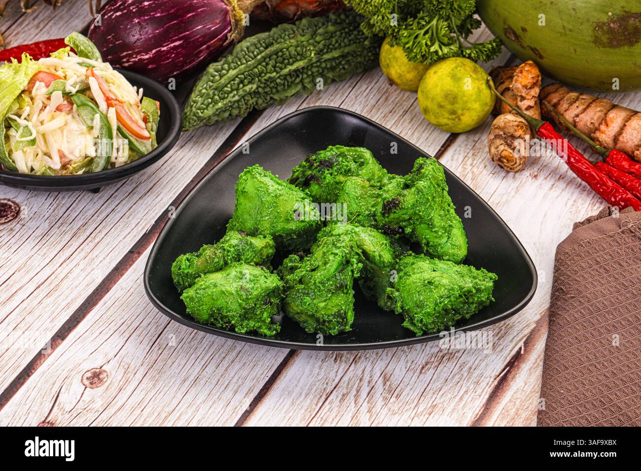 Indian green chicken mint tikka barbecue Stock Photo - Alamy
