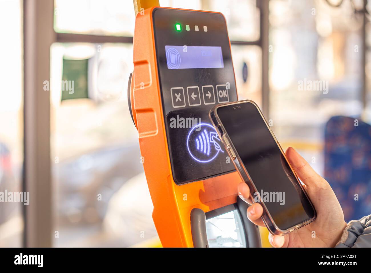 Paying for public transport by card. Public transport. Contactless fare ...