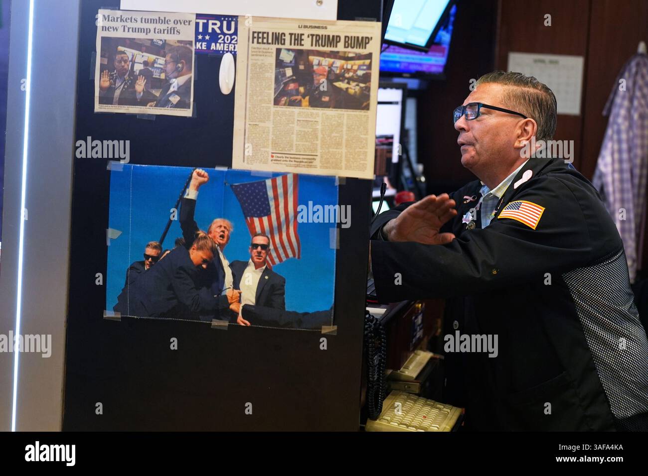 Jonathan Mueller works on the floor at the New York Stock Exchange in ...