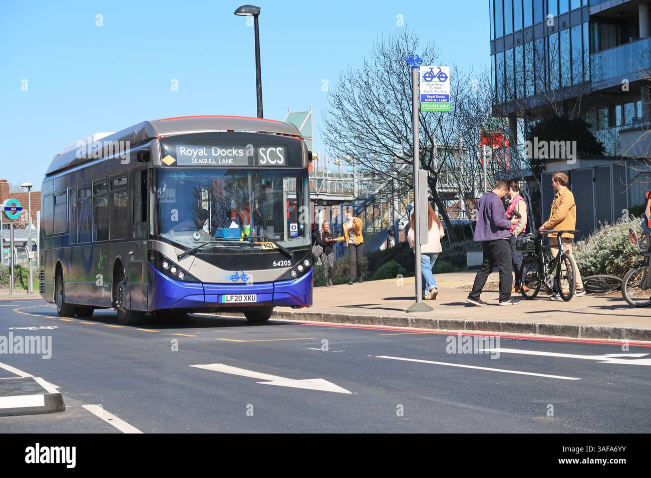 Cyclists using the new Silvertown Tunnel Shuttle Bus. Northern pick-up ...