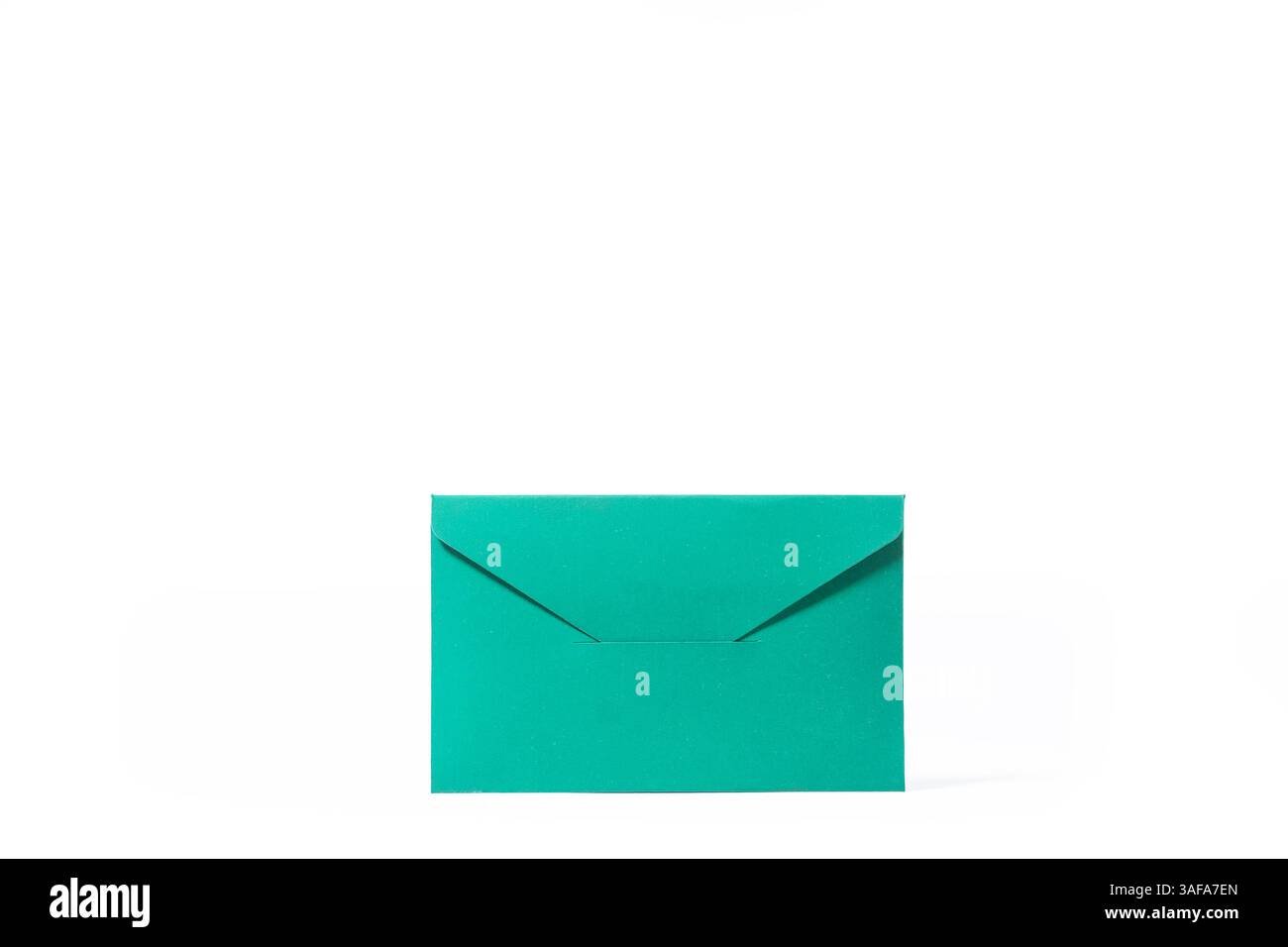 Green envelope on white background Stock Photo - Alamy